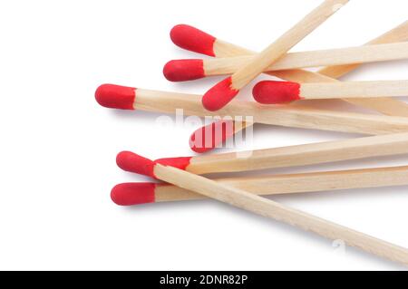 Studio shot of red tipped matches cut out against a white background ...