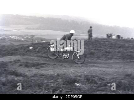 1960s, historical, motorcycle scramble, a rider on his bike on the ...