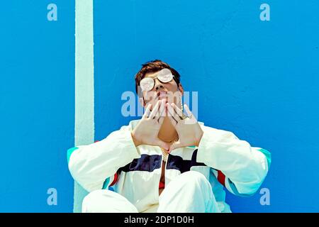 Hands showing the triangle sign Stock Photo - Alamy