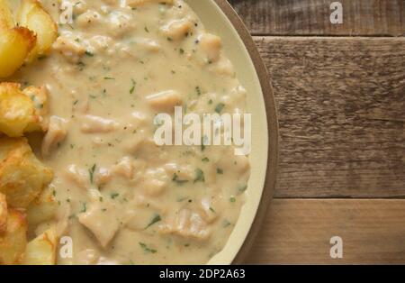 Tripe and onions. Traditional food UK Stock Photo - Alamy