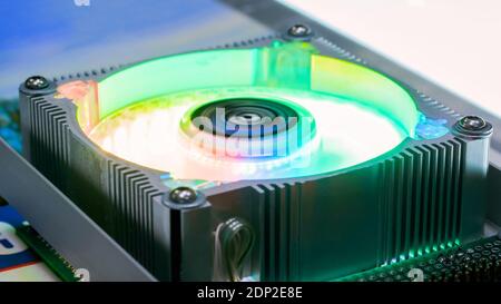 Computer cooler with RGB LED light. Computer circuit board and CPU ...