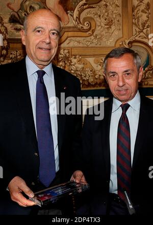 Former soccer player Alain Giresse attends a photocall before the ...