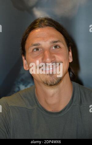 Zlatan Ibrahimovic signs autographs for his fan at Colette store for ...