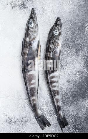 Raw icefish on a kitchen table. White background. Top view Stock Photo ...