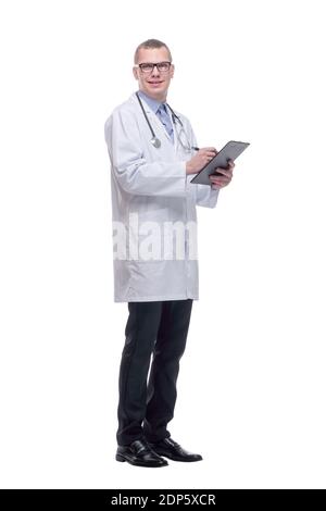Happy smiling doctor writing on clipboard Stock Photo - Alamy