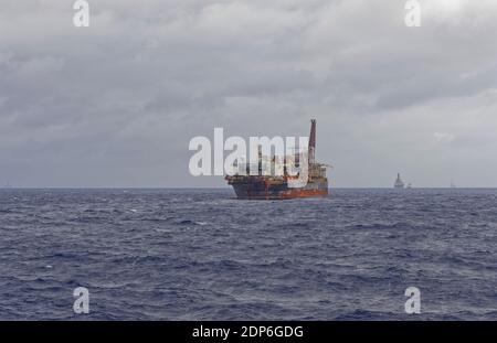 Gas flare of an offshore FPSO oil rig Stock Photo - Alamy