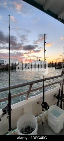 Fishing boat with rods set for deep water fishing – Gulf of Mexico ...