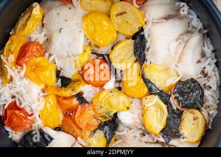 One pan fabulous fish, with basmati rice and cherry tomatoes, on old ...