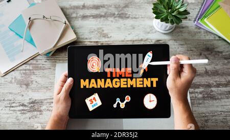 Concept of time management with icons on mesh network Stock Photo - Alamy