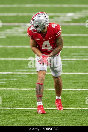 Ohio State wide receiver Julian Fleming, right, flips over Indiana ...