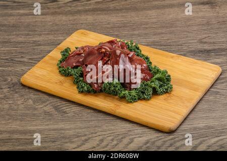 Raw chicken liver over board for cooking Stock Photo - Alamy