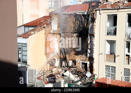 Lisbon, Portugal. 20th Dec, 2020. Smoke rises from a destroyed building ...