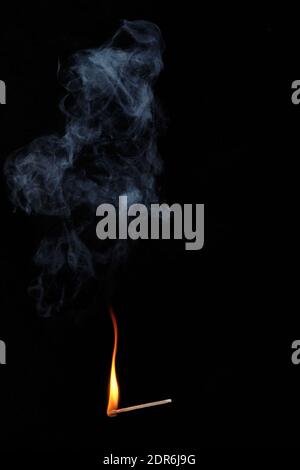Just Struck Matchstick Floating Weightlessly Stock Photo - Alamy