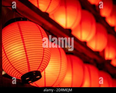 Light up traditional red Japanese rice paper balloons at a festival in ...