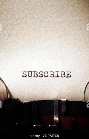 Subscribe word written with a typewriter Stock Photo - Alamy