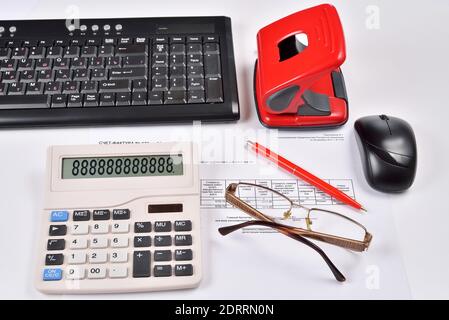 Accounting: invoice, keyboard, calculator, mouse, hole punch, glasses ...