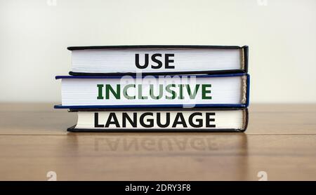 Use inclusive language symbol. Books with words 'Use inclusive language ...