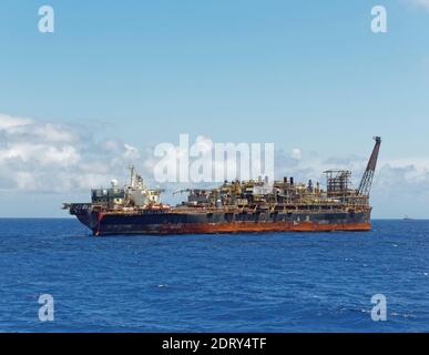 The Starboard side of the P-37 FPSO moored on the Marlim Field offshore ...