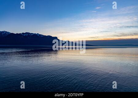 A mesmerizing view of a wavy lake on background of yellow and blue ...