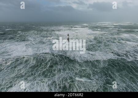 Ar-Men lighthouse during heavy storm off Brittany, western France on ...