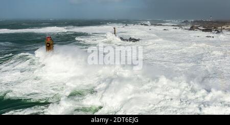 'Nividic' lighthouse during heavy storm off Ouessant Island, in ...