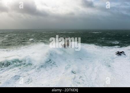 Tevennec lighthouse during heavy storm off Brittany, western France on ...
