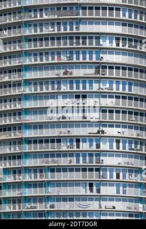 Walls of a high rise residential tower block with painting of an ethnic ...