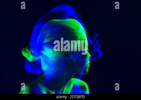 double exposure of advertising image of female cyclist wearing ...