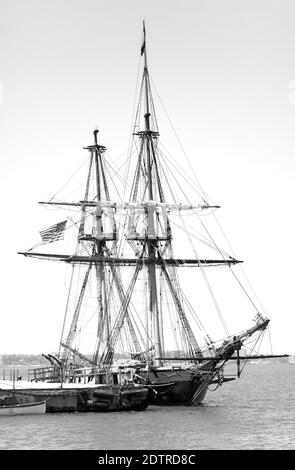 Grayscale sailing ship in the sea in the cloudy weather Stock Photo - Alamy