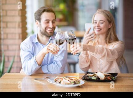 Photo portrait of young lovely lady lean on white billboard hold ...
