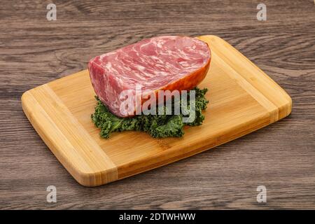 Tasty Beef ham piece over board Stock Photo - Alamy