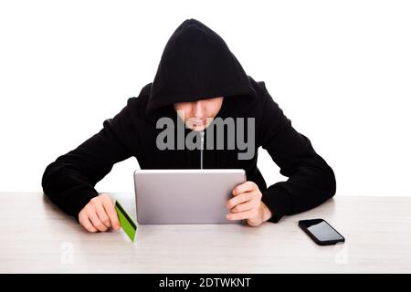 Hacker with a Tablet Computer and Bank Card on the White Background ...