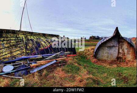 Upturned fishing boat or Currach used for storage on Holy Island Stock ...