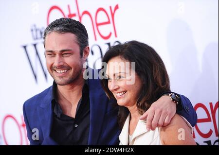 Taylor Kinney with his mother at the Los Angeles premiere of "The Other ...