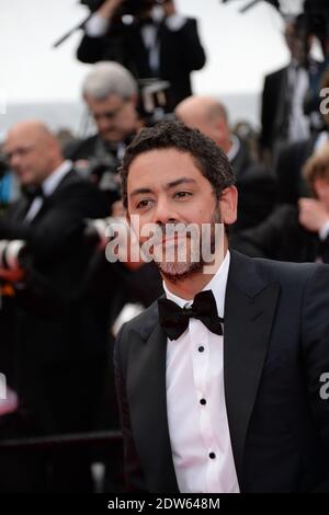 Manu Payet arriving at Saint-Laurent screening held at the Palais Des ...