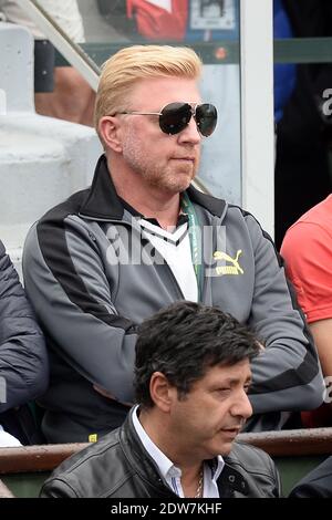 Boris Becker watching a game during the eight-final round of the French ...