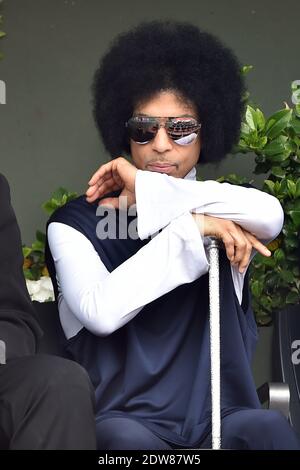 Singer Prince watches from the stands Spain’s Rafael Nadal playing ...