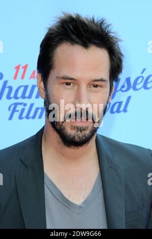 Keanu Reeves attends the Side By Side premiere part of the Champs ...