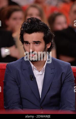 Syrus Shahidi at the taping of Vivement Dimanche on April 22, 2014 in ...