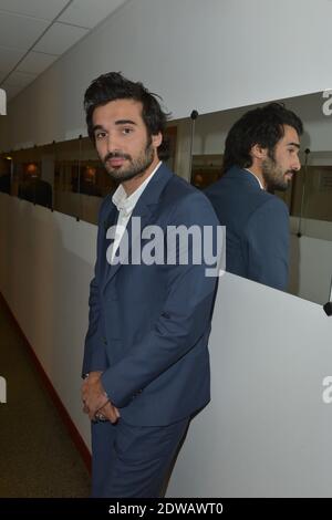 Syrus Shahidi at the taping of Vivement Dimanche on April 22, 2014 in ...