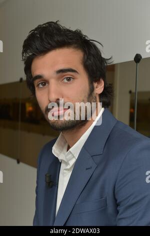 Syrus Shahidi at the taping of Vivement Dimanche on April 22, 2014 in ...