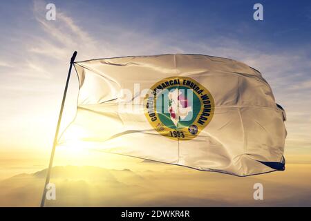 Embera-Wounaan comarca of Panama flag waving on the top sunrise mist ...