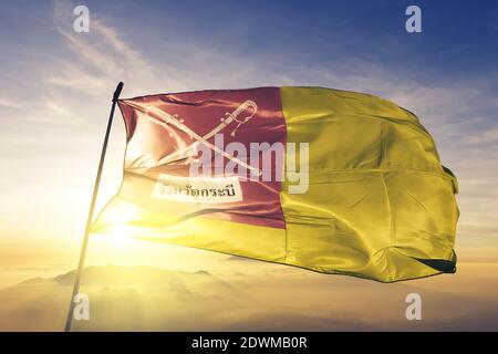 Krabi province of Thailand flag waving on the top sunrise mist fog ...
