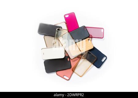 Pile of multicolored plastic back covers for mobile phone. Choice of ...