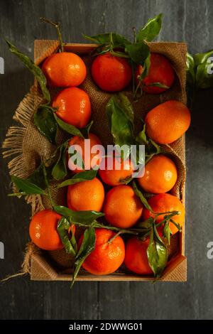 Wooden box of clementines Stock Photo - Alamy