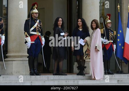 L-R : Mona Khazindar, Saudi artists (sisters) Shadia and Raja Alem ...