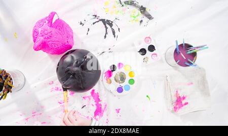 Flat lay. Painting craft pumpkin with acrylic paint for Halloween Stock ...