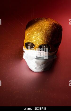 human skull wearing hospital mask - contagious disease concept Stock ...