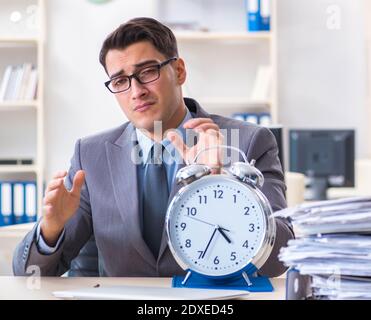 Employee failing to meet tax reporting deadlines Stock Photo - Alamy