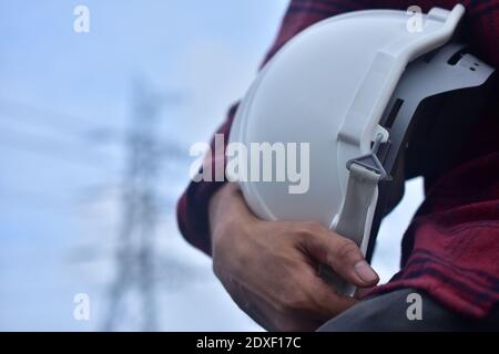 Engineering electrician hold white hard hat safety helmet Stock Photo ...